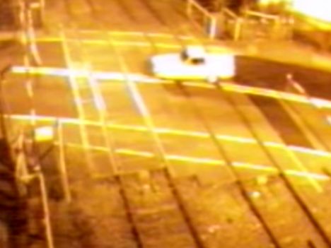 CCTV footage shows yellow Reliant Robin car reversing…