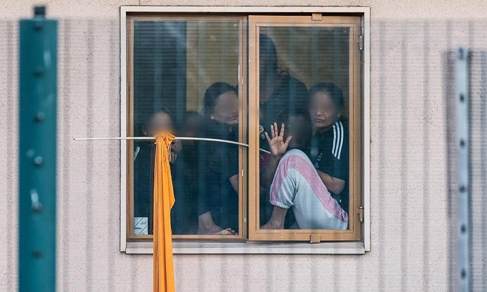 Woman 'feared for life' after guards restrained her in…