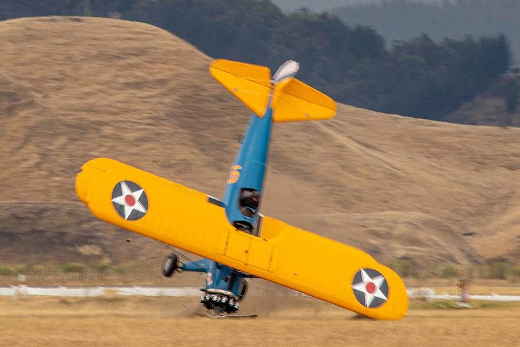 Two walk away with minor injuries after biplane…