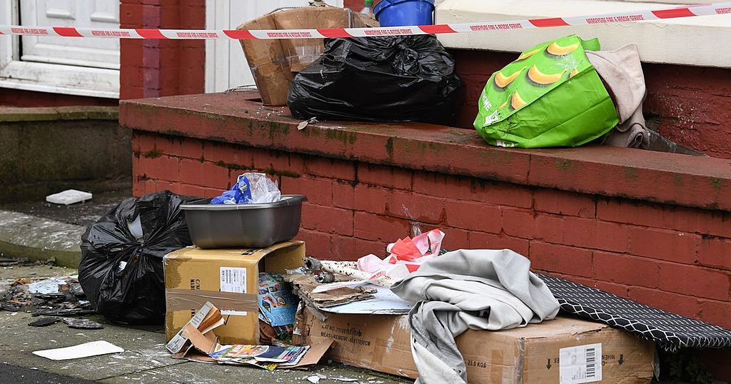 Piles of clutter inside home where pensioner was…