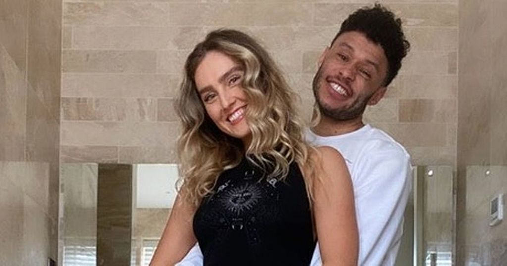 Perrie Edwards and boyfriend Alex pile on the PDA as…