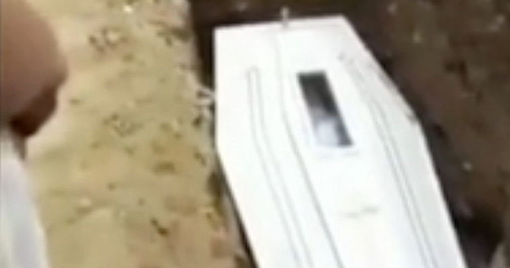 Terrifying Moment Corpse Waves From Inside Coffin