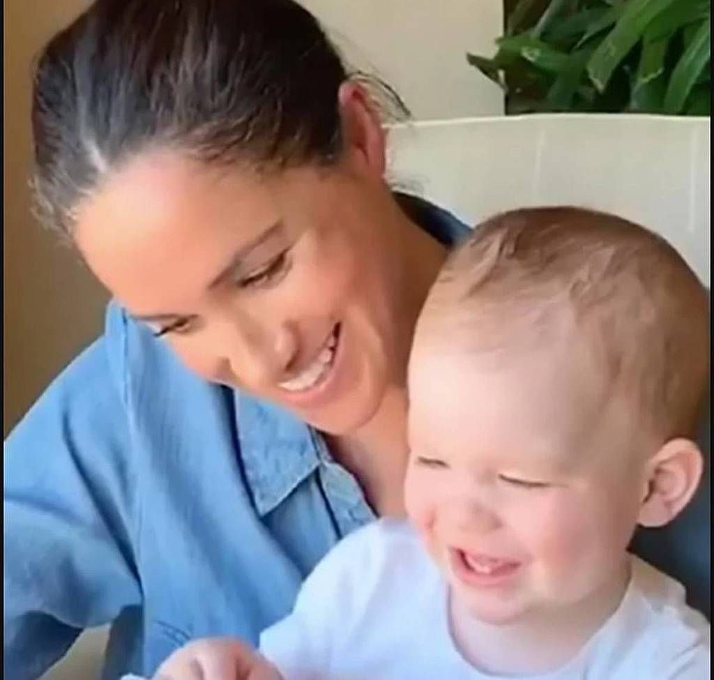 Archie's first birthday: Cake and balloons in…