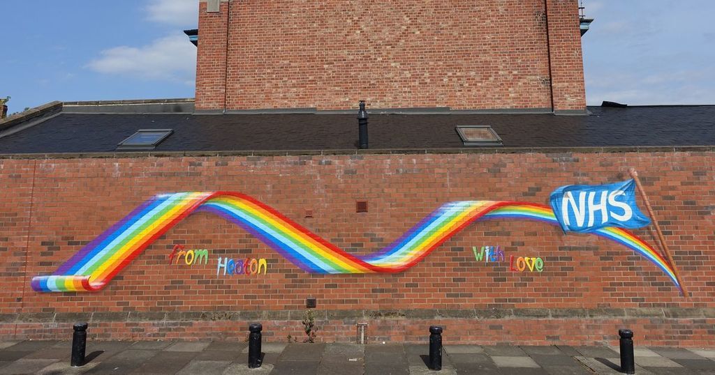 The story behind the huge mural that appeared on the…