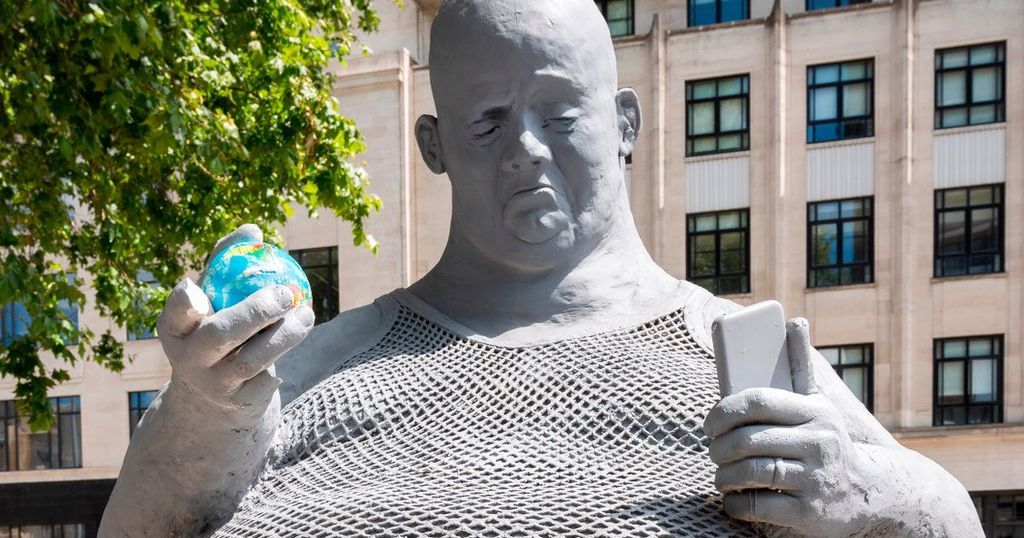 New 'statue' of bald fat man in wheelie bin appears…