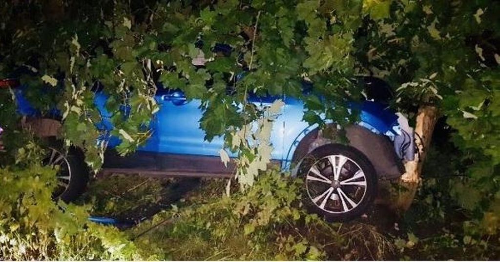 Shocking photographs of crumpled wreck of car lodged…