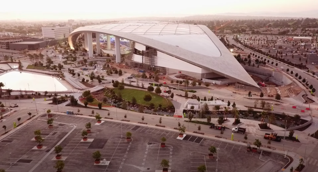 Drone footage shows 97% complete SoFi Stadium, logo on…