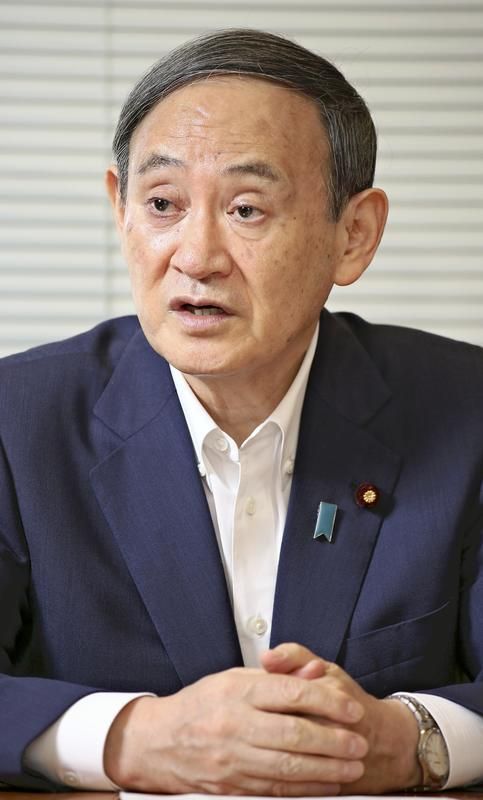 Chief Cabinet Secretary Yoshihide Suga: Japan govt…